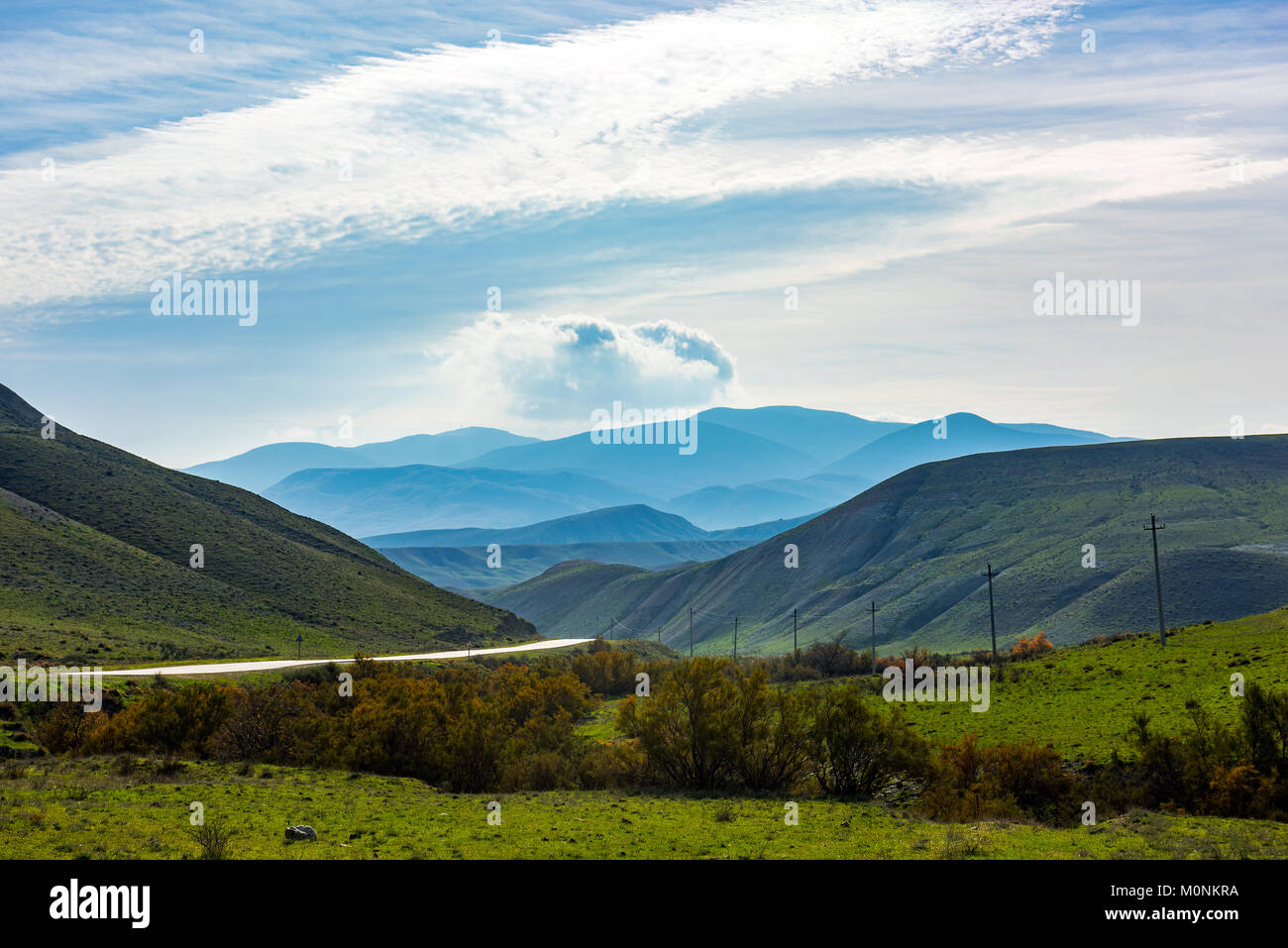 Hilly mountains in the valley, mountain landscape Stock Photo - Alamy