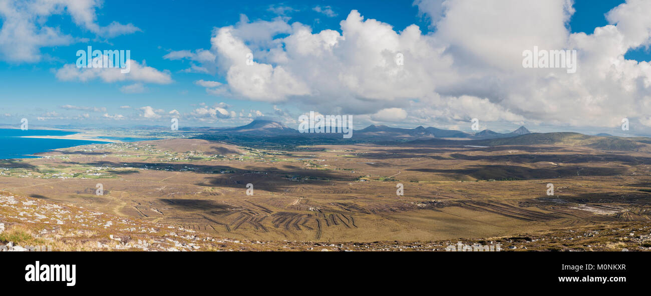 Panorama from high on Cnoc Fola across the cut bogland towards the ...