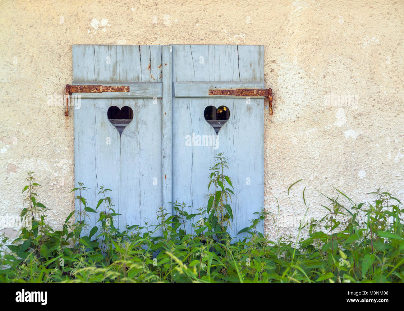 Old closed blue shutter hi-res stock photography and images - Alamy