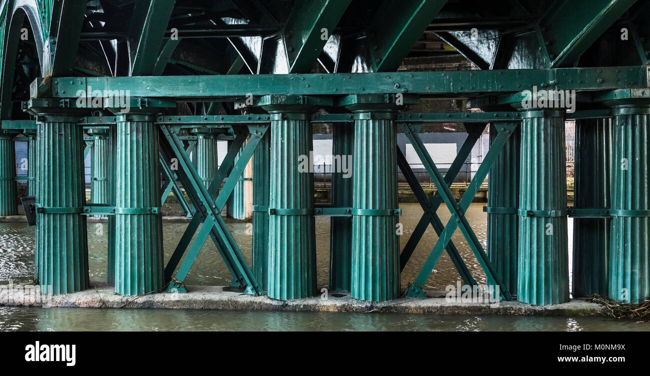 The 19th century cast iron railway bridge over the River Nene in ...