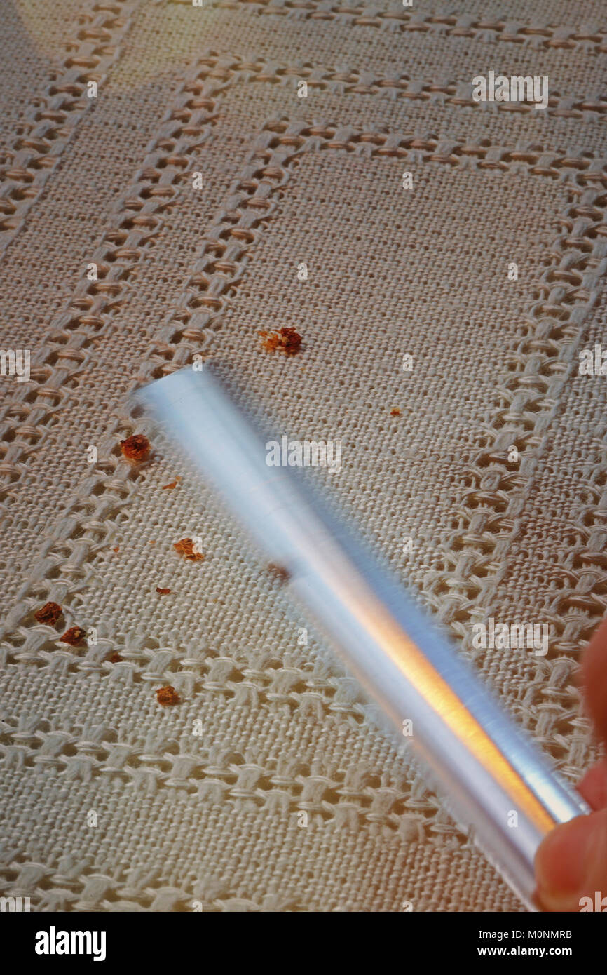 Crumber Removing Crumbs from Linen Placemat Stock Photo - Alamy