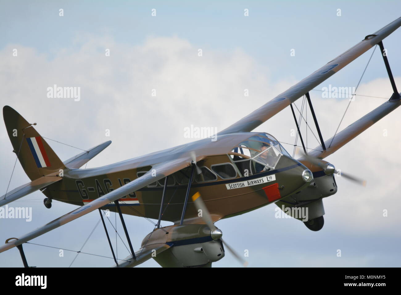 De Haviland Dragon Rapide 1930s passenger airplane G-AGJG in camouflage ...