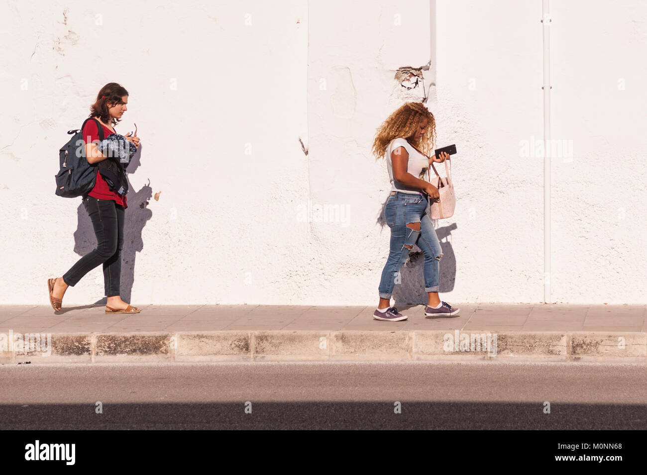 People walking near the bus station in Mahon , Menorca , Balearic ...