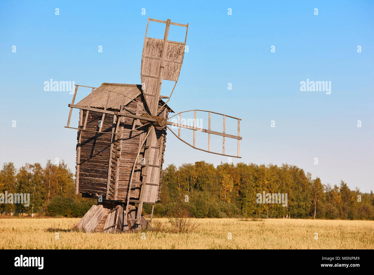 Antique traditional wooden windmill in the countryside. Finland ...