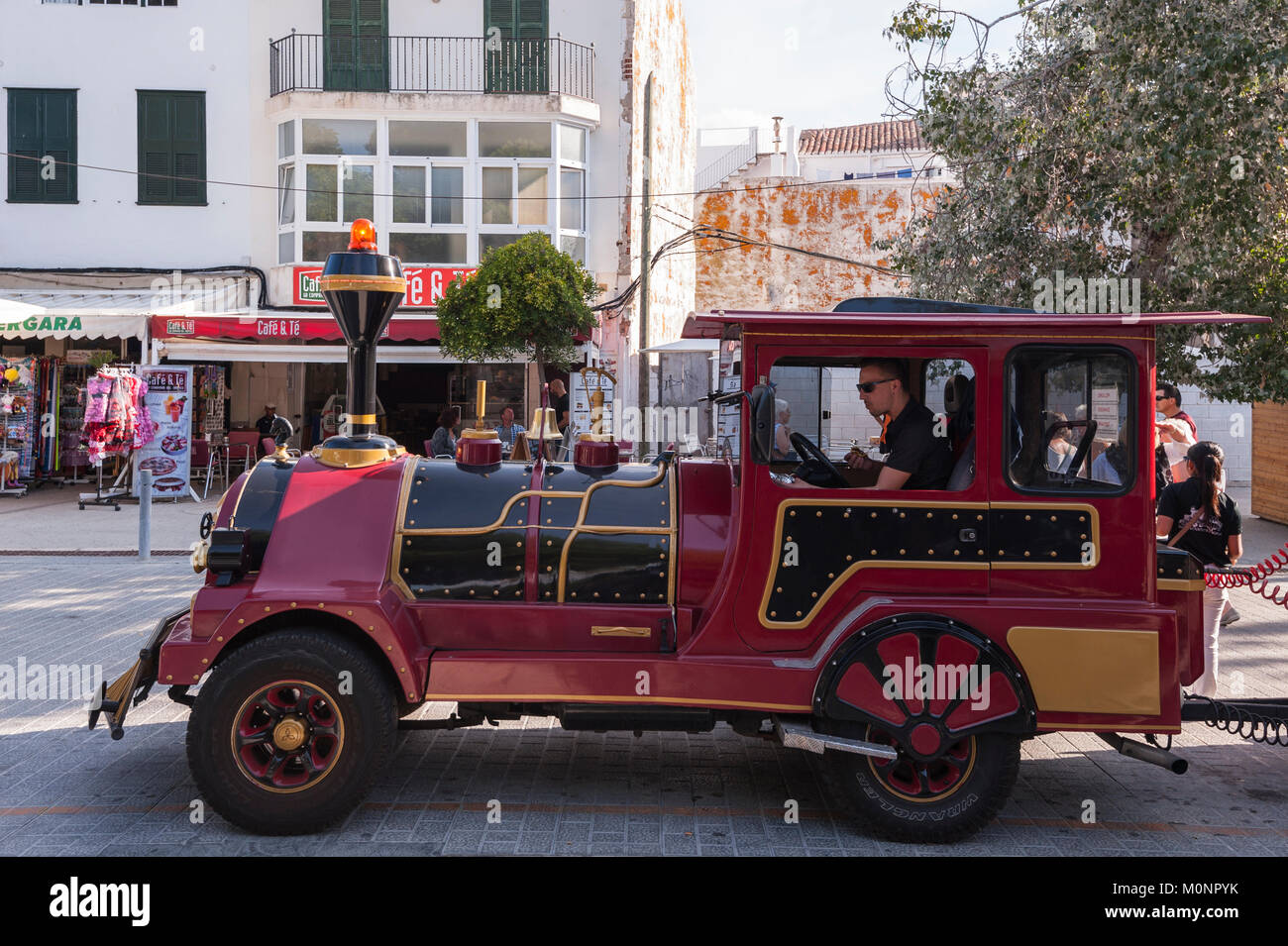 A tourist road train in Mahon , Menorca , Balearic Islands , Spain ...