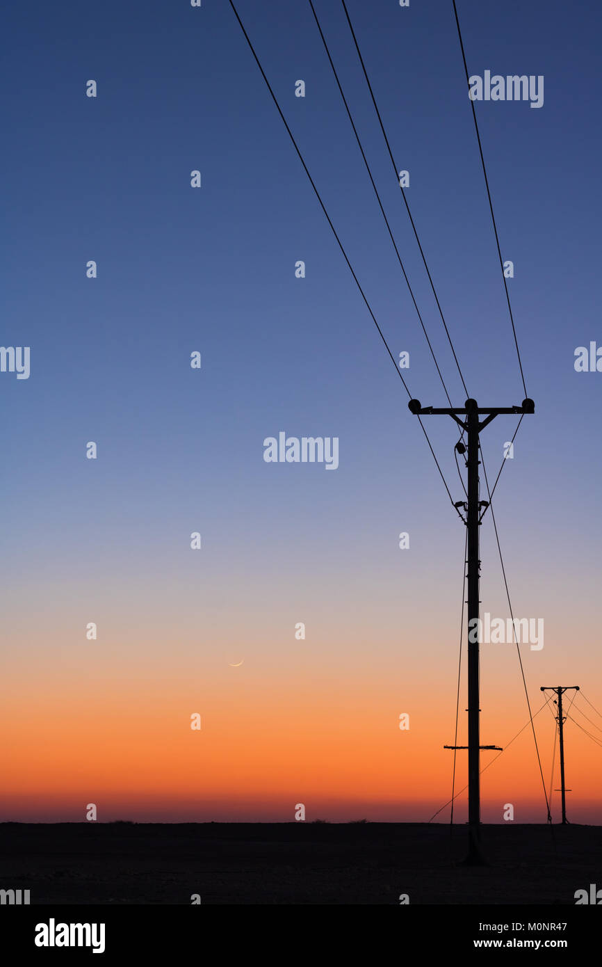 Blue hour time after sunset showing a glimpse of the moon early ...
