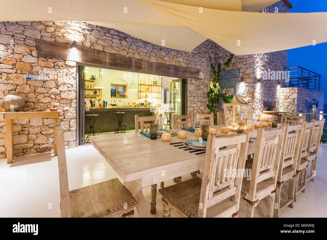 dinning area with big table in a private summer resort Stock Photo - Alamy