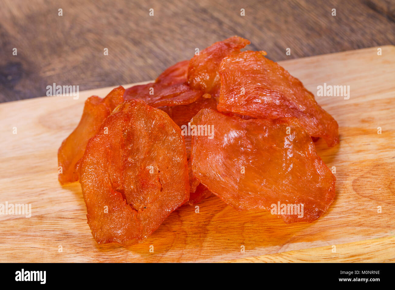 Dry chicken meat over wooden Stock Photo - Alamy