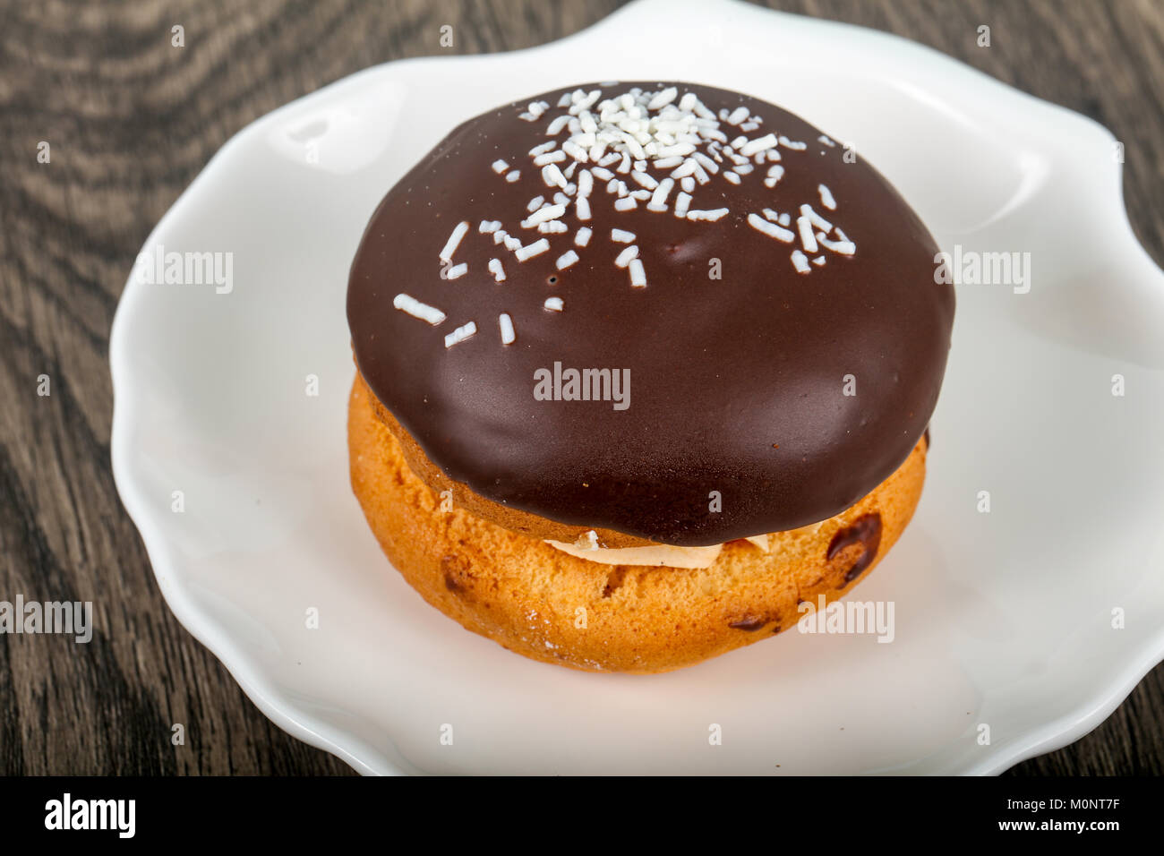 Bouchee cake with chocolate Stock Photo - Alamy
