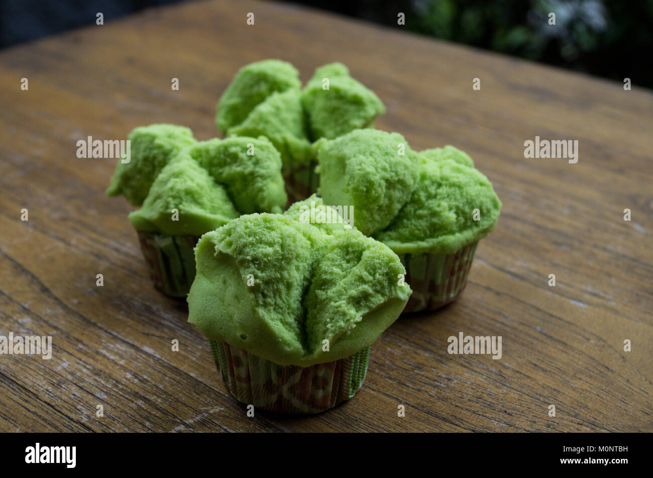 BOLU KUKUS - Typical Indonesian sweets on table Stock Photo - Alamy