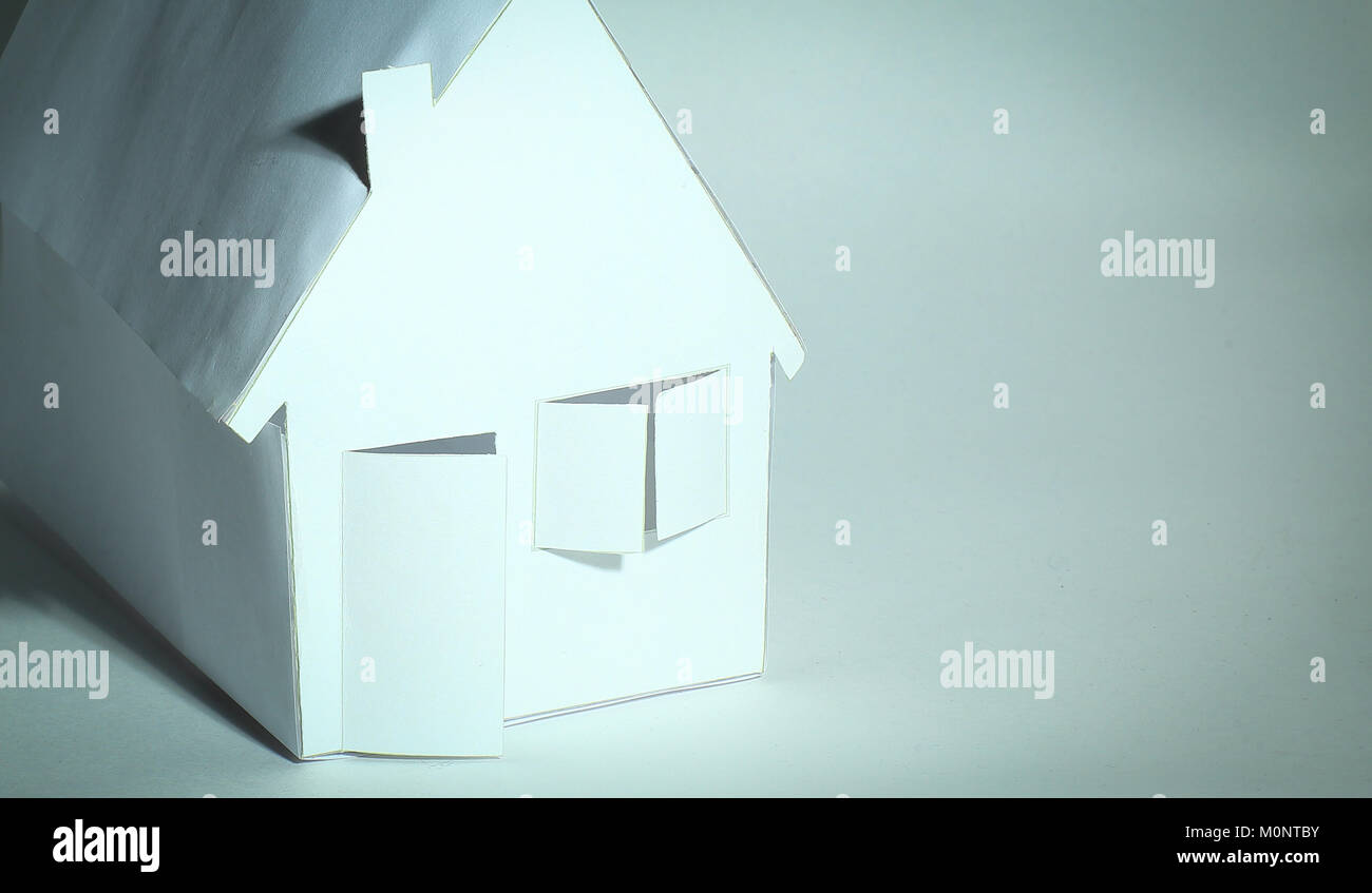 paper house paper background.the concept of a mortgage Stock Photo - Alamy