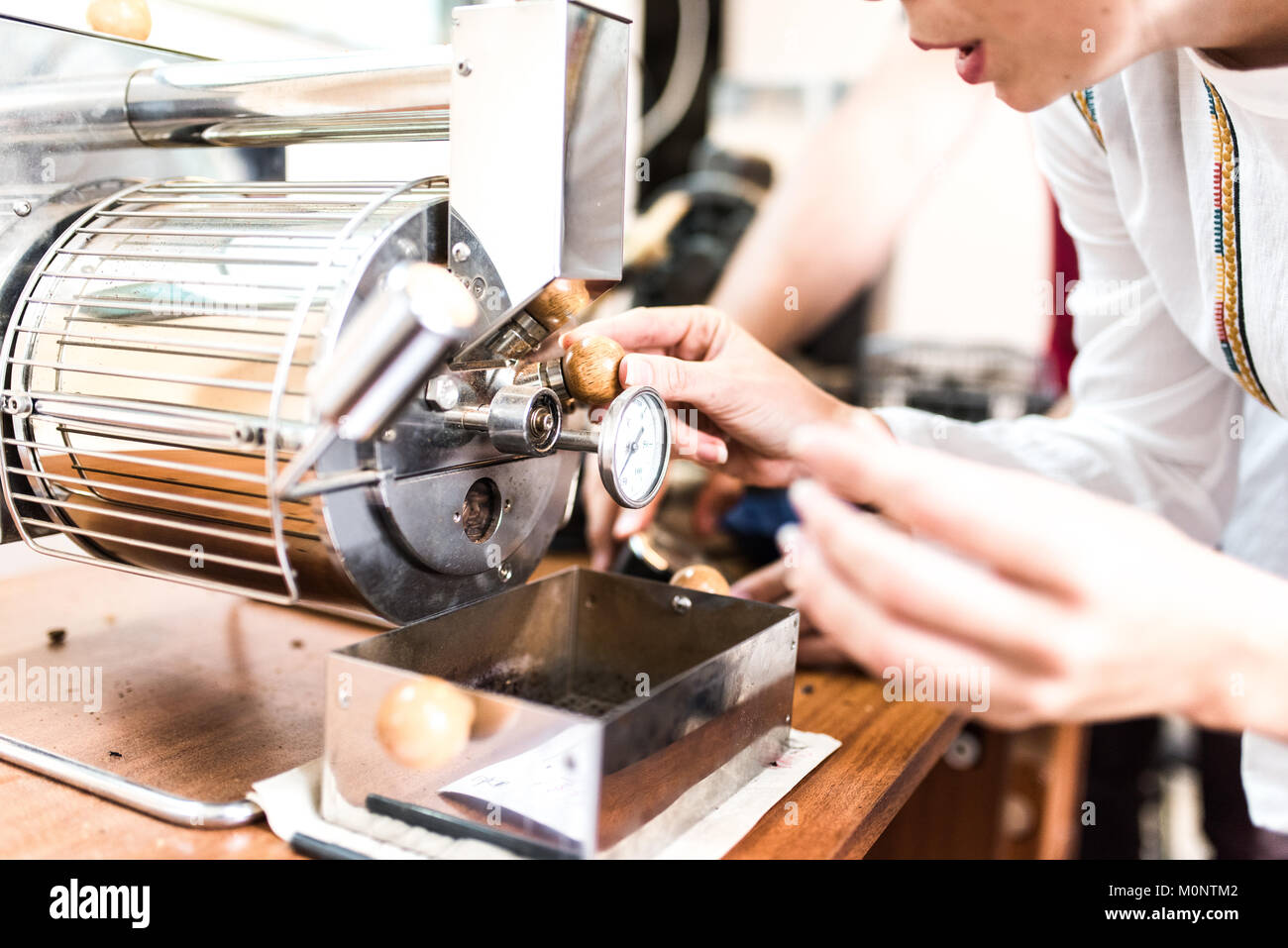 Coffee roasting, coffee toasting Stock Photo - Alamy
