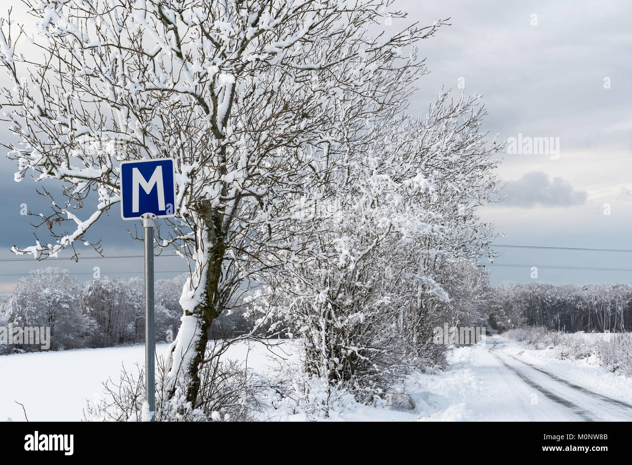 Passing place road sign by a narrow country road in winter season Stock ...