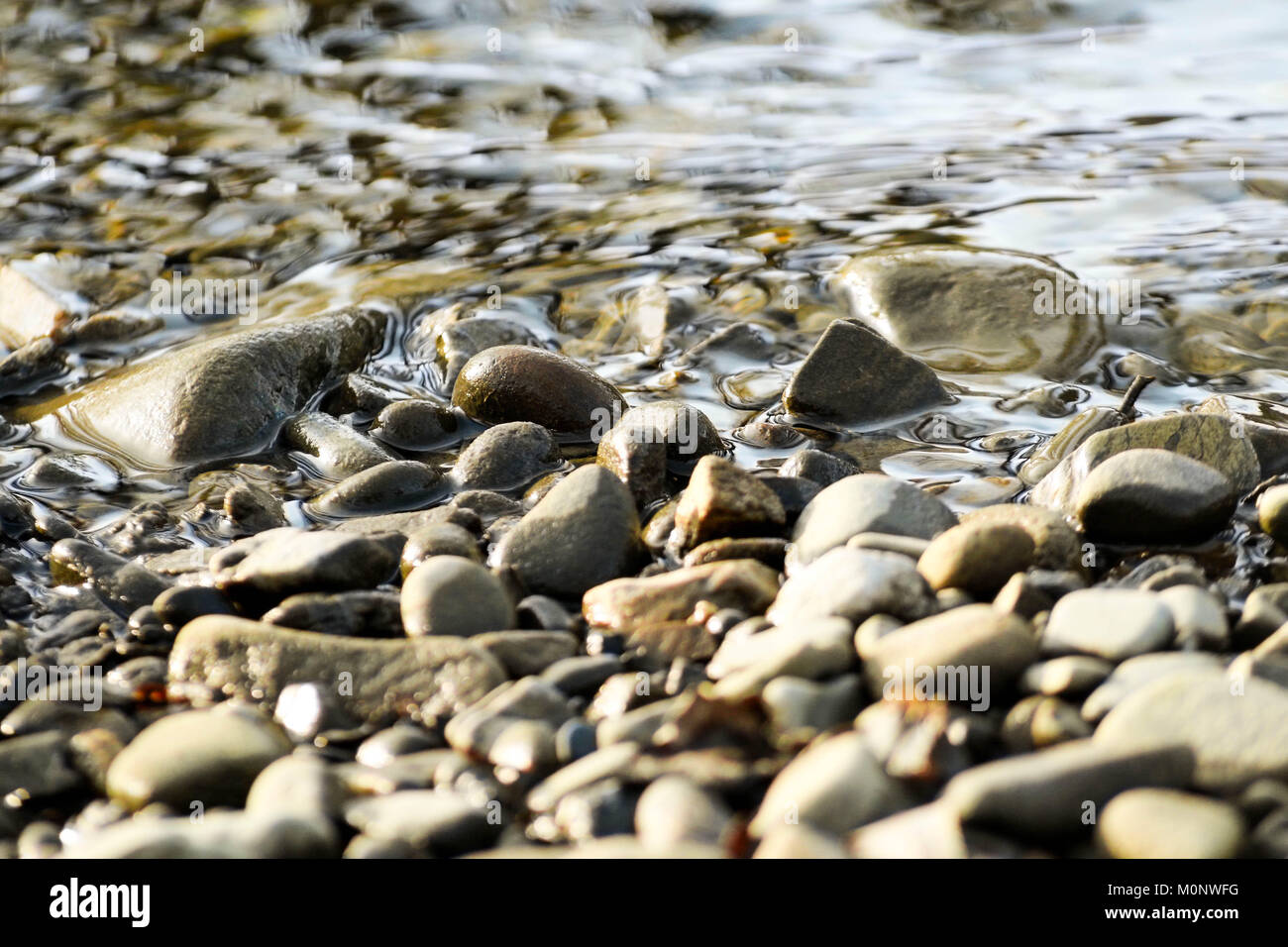 Stones rocks pebbles brown river rocks hi-res stock photography and ...