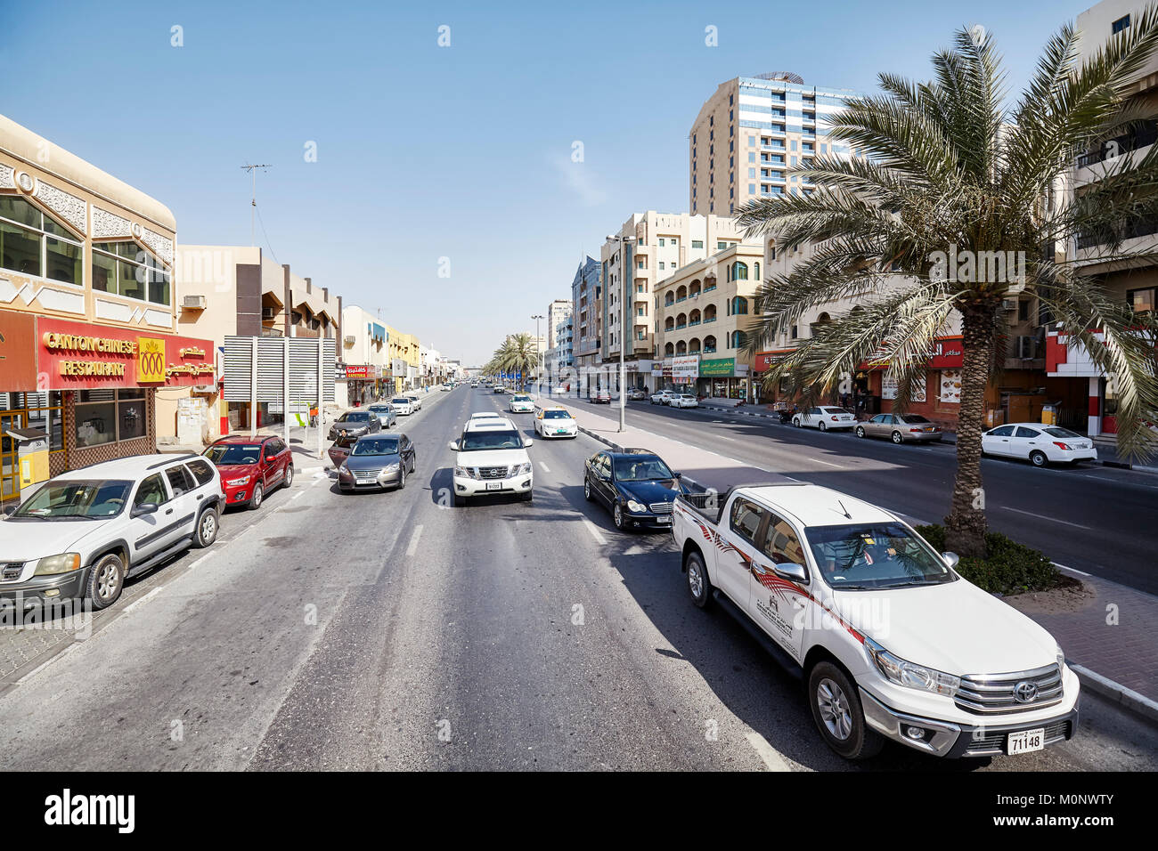 Sharjah, United Arab Emirates - May 03, 2017: Busy street in downtown ...