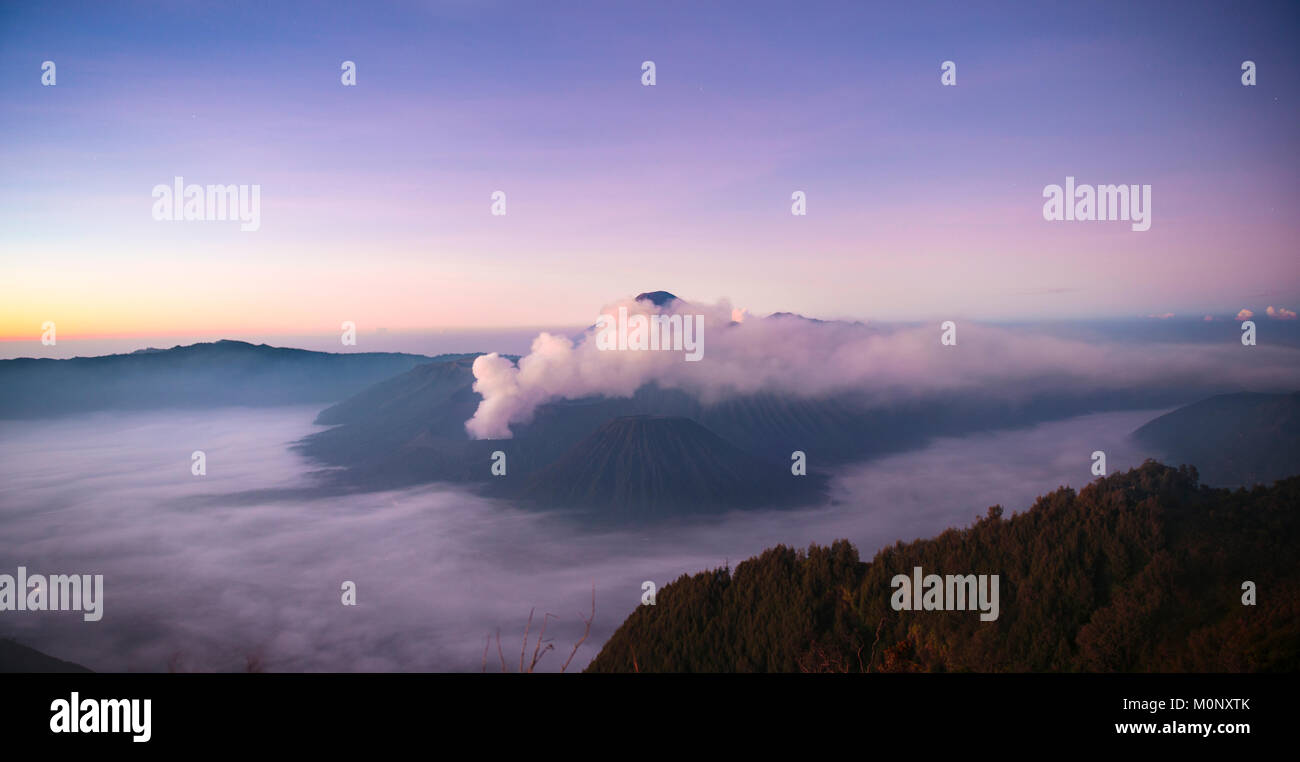 View of Caldera Tengger with volcanoes at sunrise,smoking volcano ...