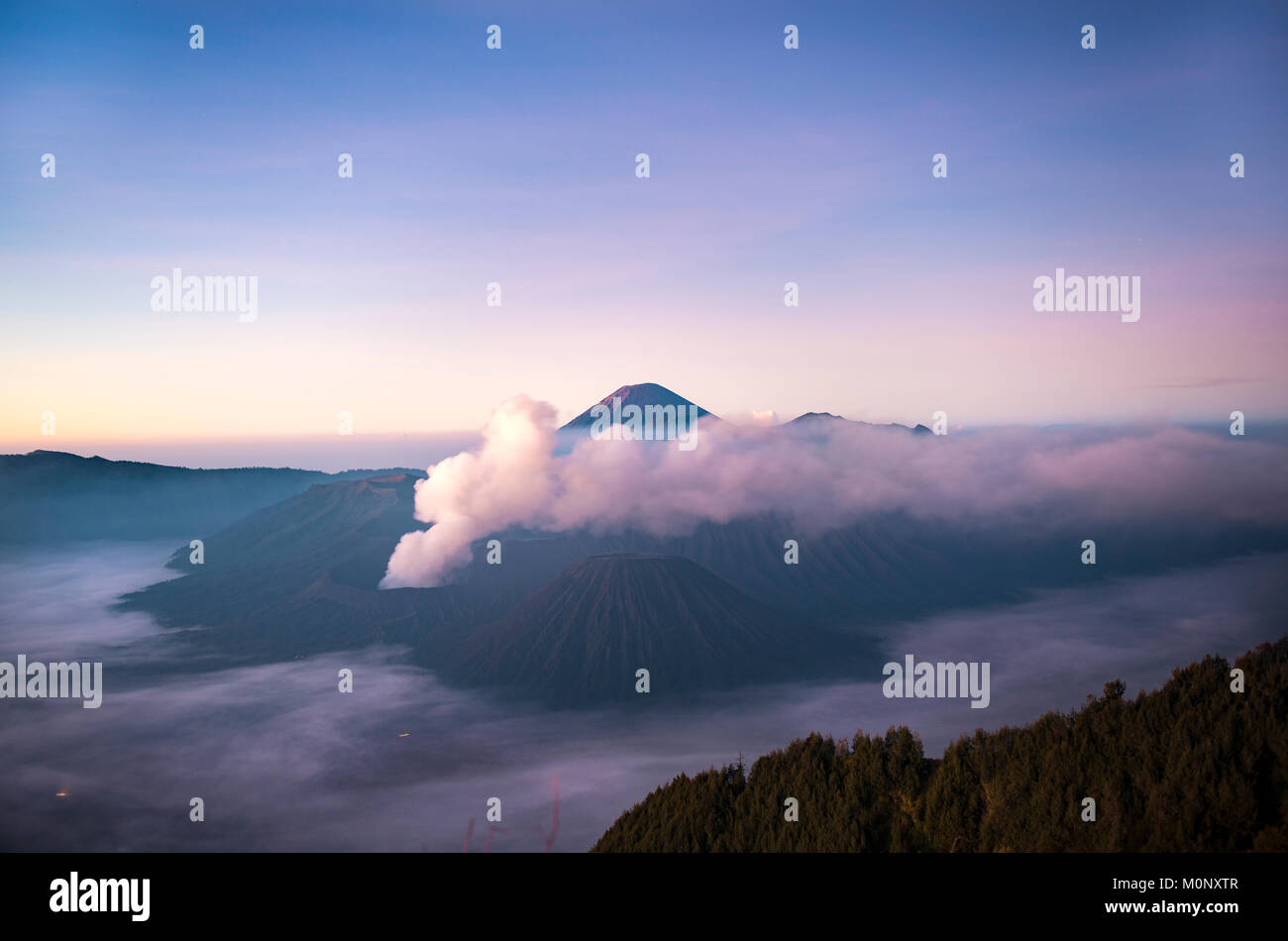 View of Caldera Tengger with volcanoes at sunrise,smoking volcano ...