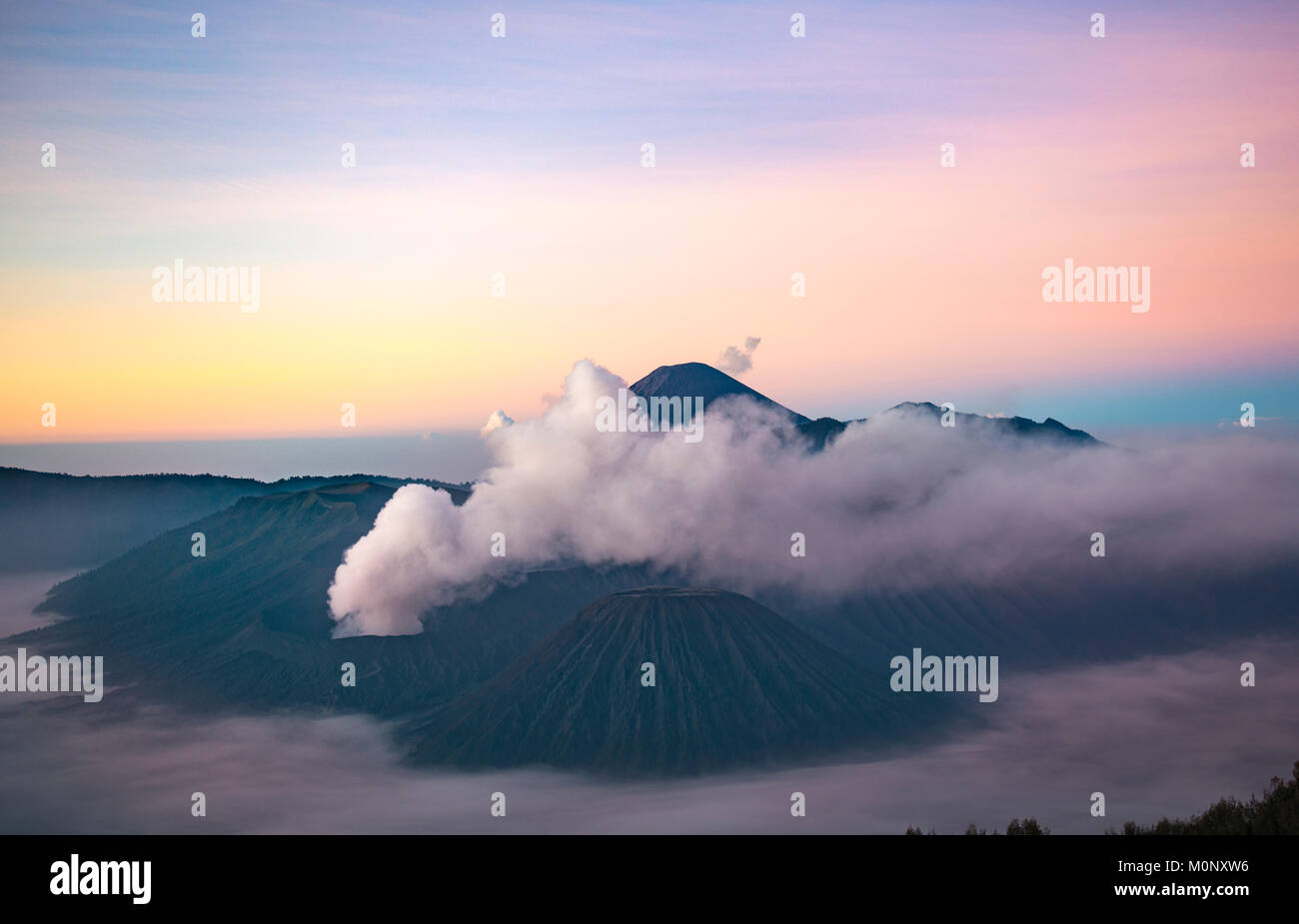 View of Caldera Tengger with volcanoes at sunrise,smoking volcano ...
