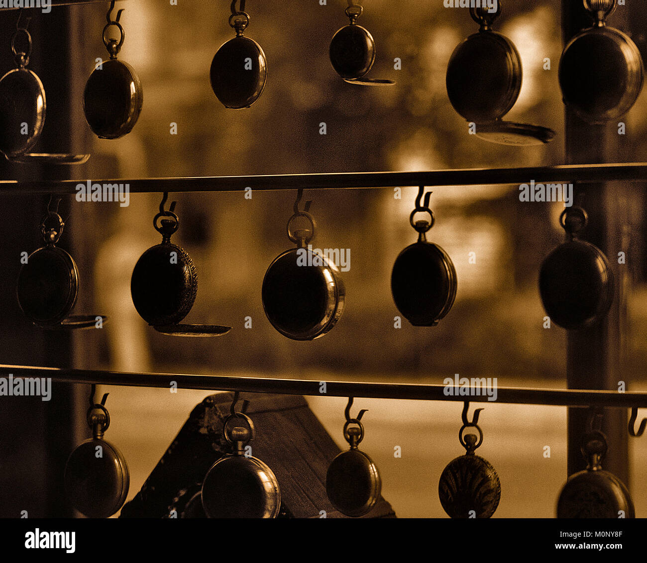 Pocket watches in window display Stock Photo - Alamy
