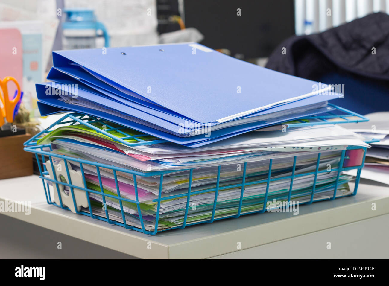 file folder and Stack of business report paper file on the table in a ...