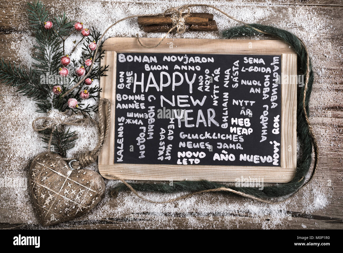 Happy new year in different languages hi-res stock photography and ...
