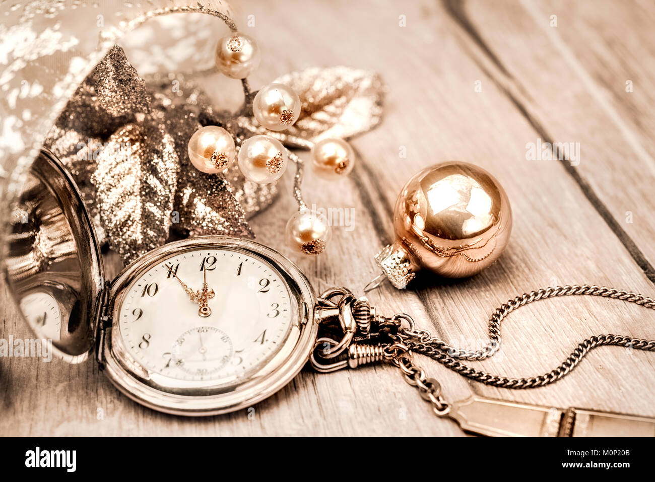 Vintage pocket clock showing five to twelve. Happy New Year! This image ...