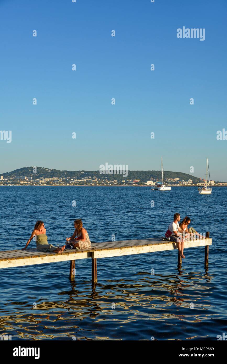 France,Herault,Bouzigues,lagoon of Thau,vacationers on a pontoon at ...