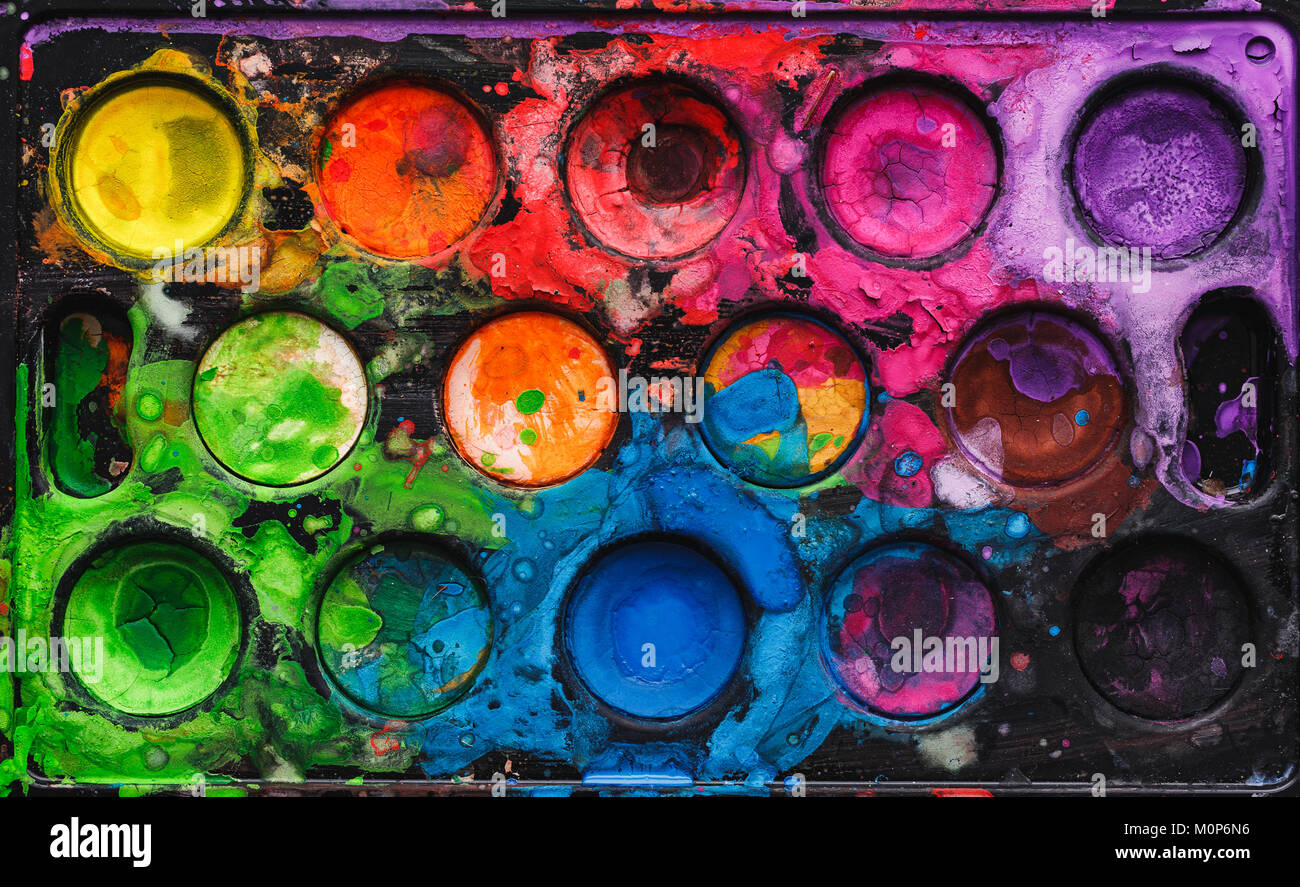 Watercolor palette with mixed colors Stock Photo - Alamy
