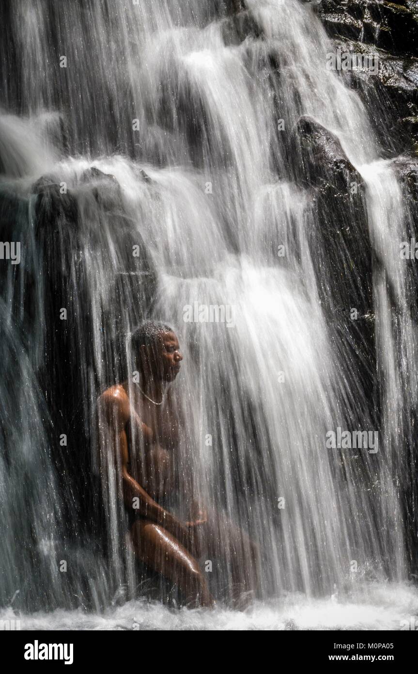 France,Guadeloupe,Basse-Terre,Petit-Bourg,bathing under the cascade of ...