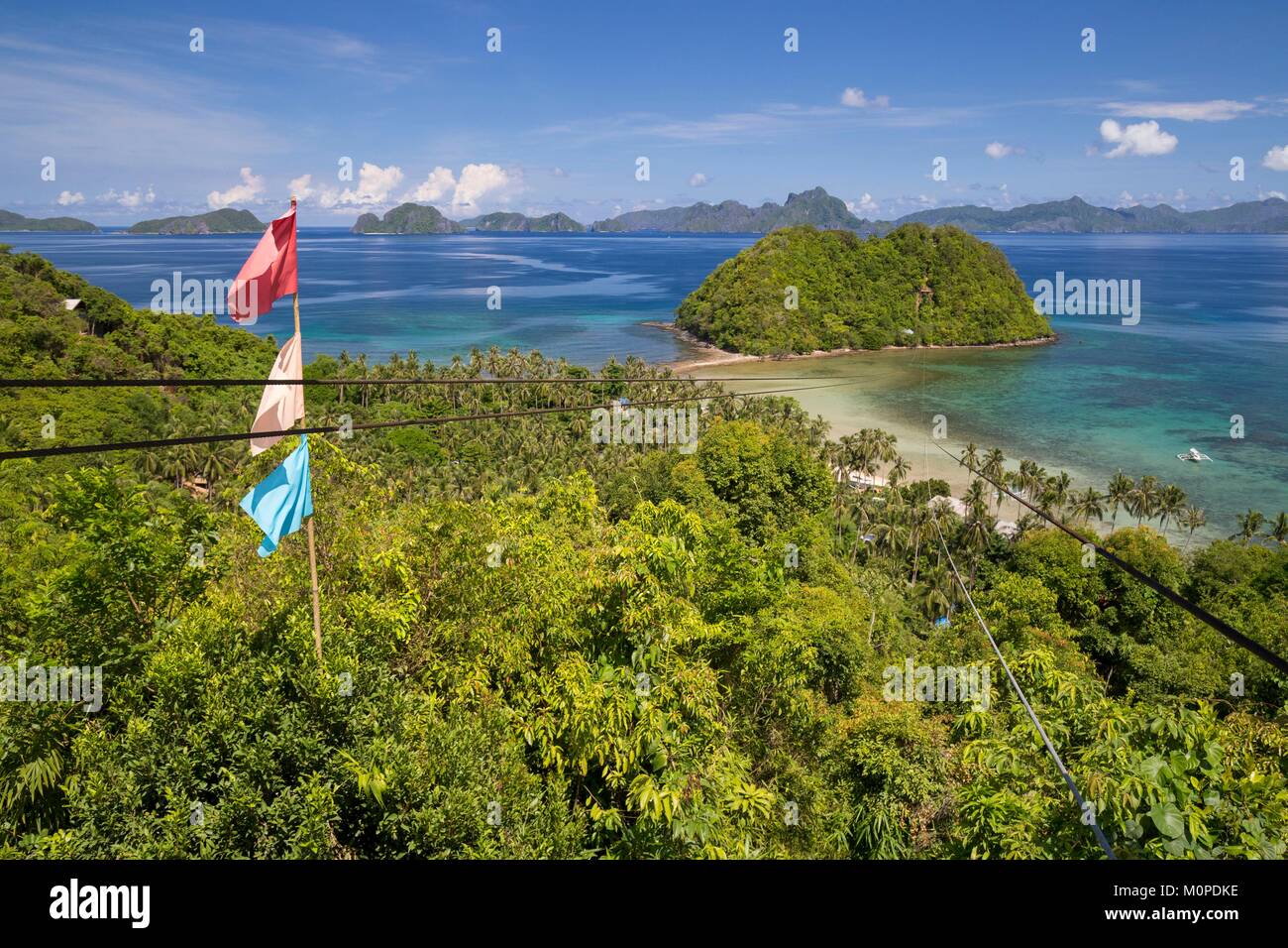 Philippines,Palawan,Las Cabañas beach,zipline over the sea joining ...