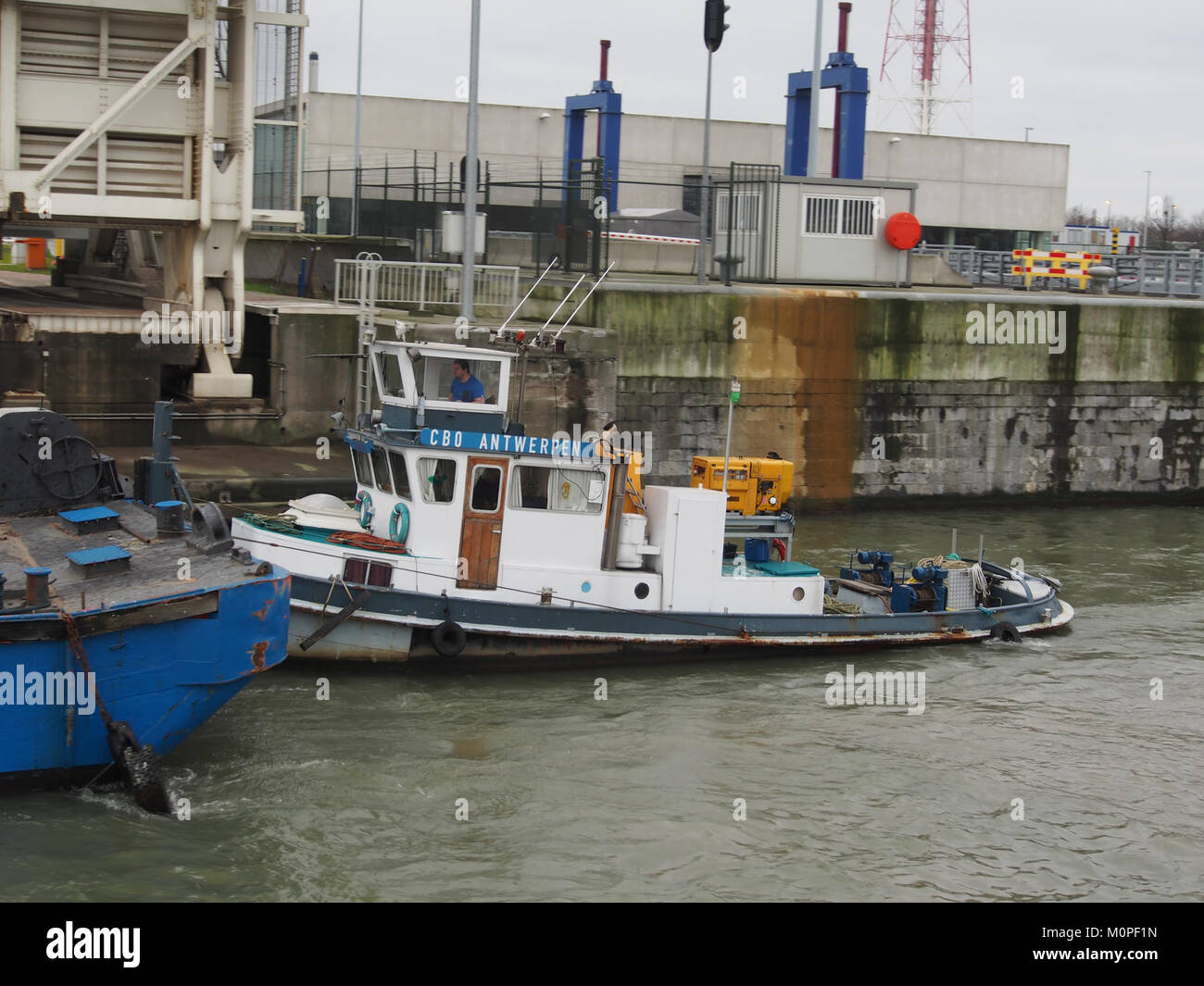 The image depicts the CBO ENI 06503402, a barge, alongside the MB5 ...