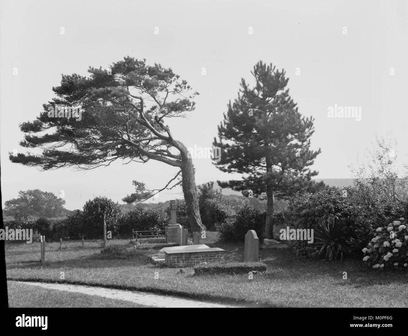 A photograph of a cemetery, showcasing its solemn atmosphere and the ...