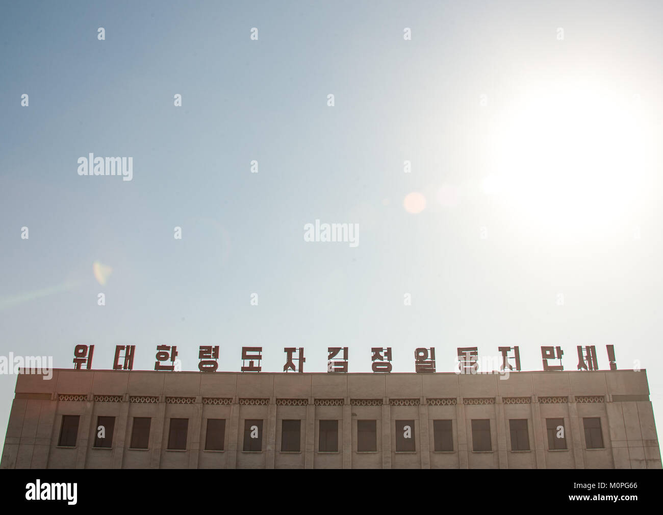 Roof of a building with propaganda slogan on the top, North Hamgyong ...