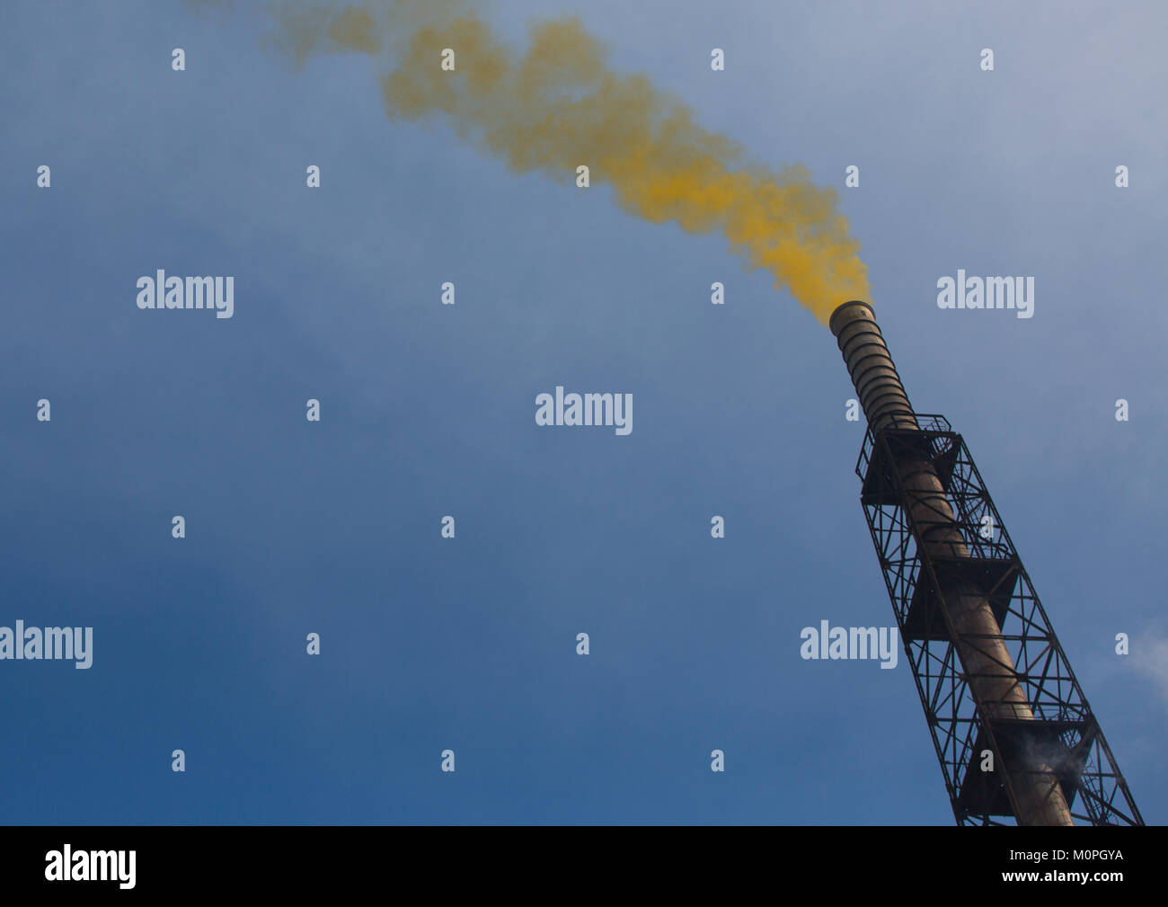 Yellow smoke coming out of a chimney in Hungnam nitrogen fertilizer ...