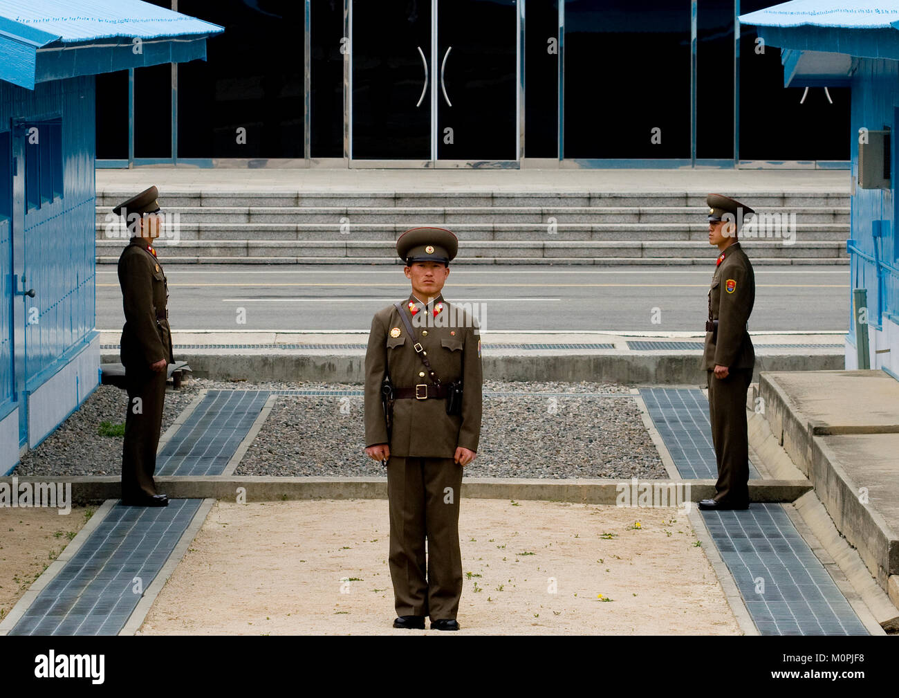 North Korean soldiers standing in front of the United Nations ...