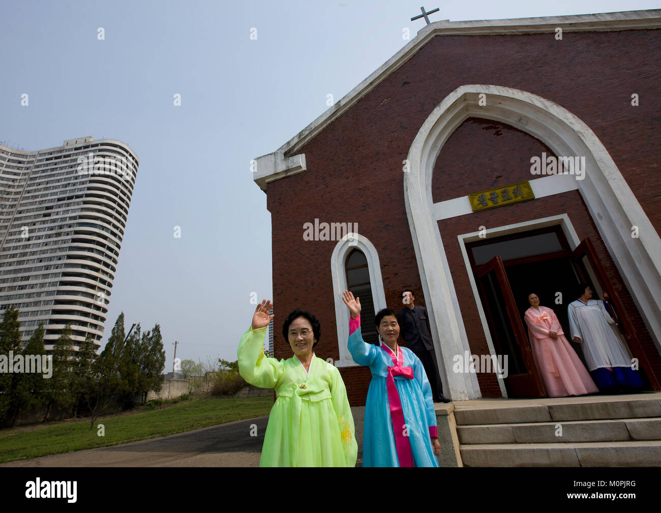 North Korean women waving in front of Chilgol protestant church ...