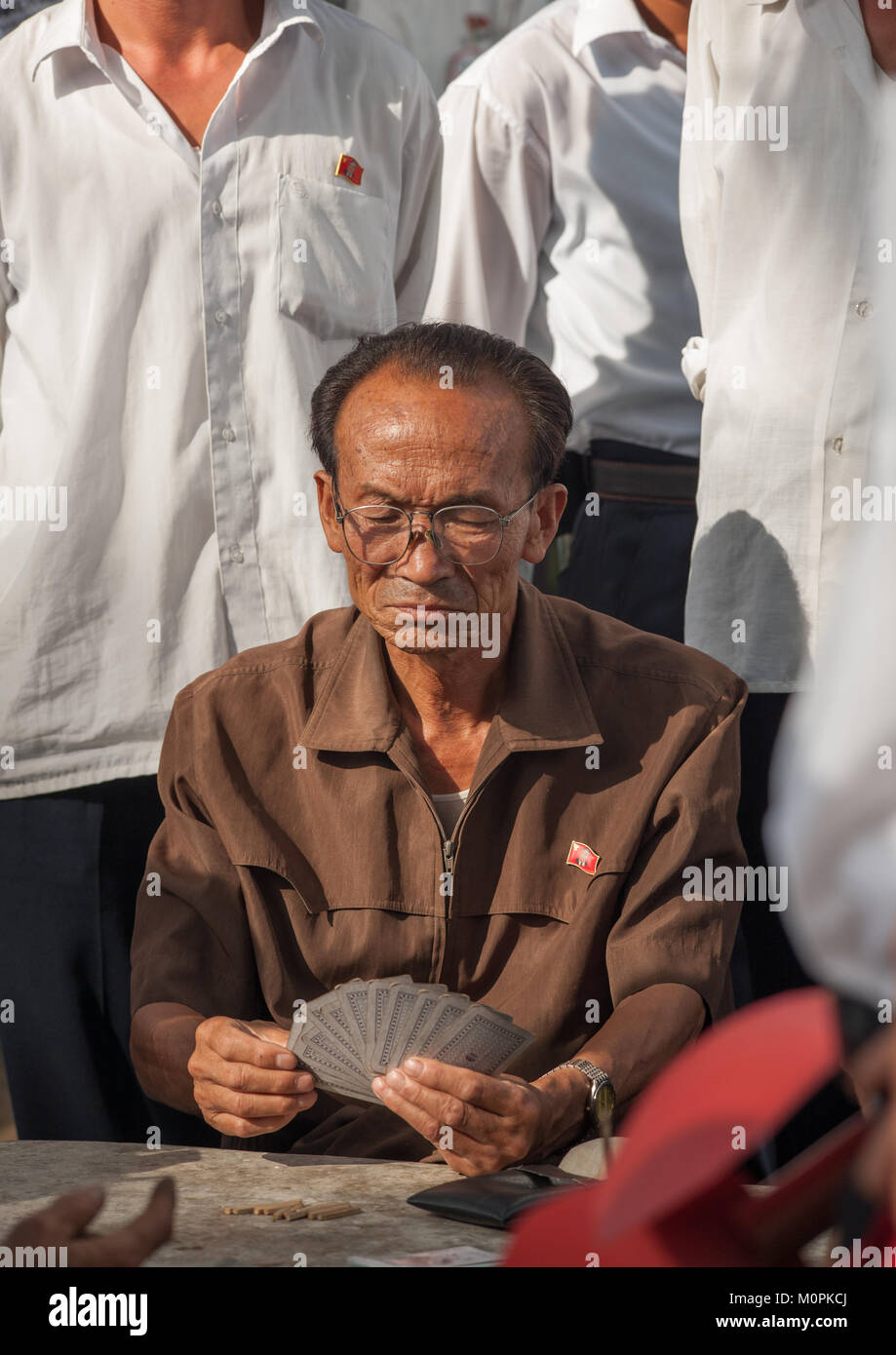 Portrait of a North Korean man playing cards, Pyongan Province ...