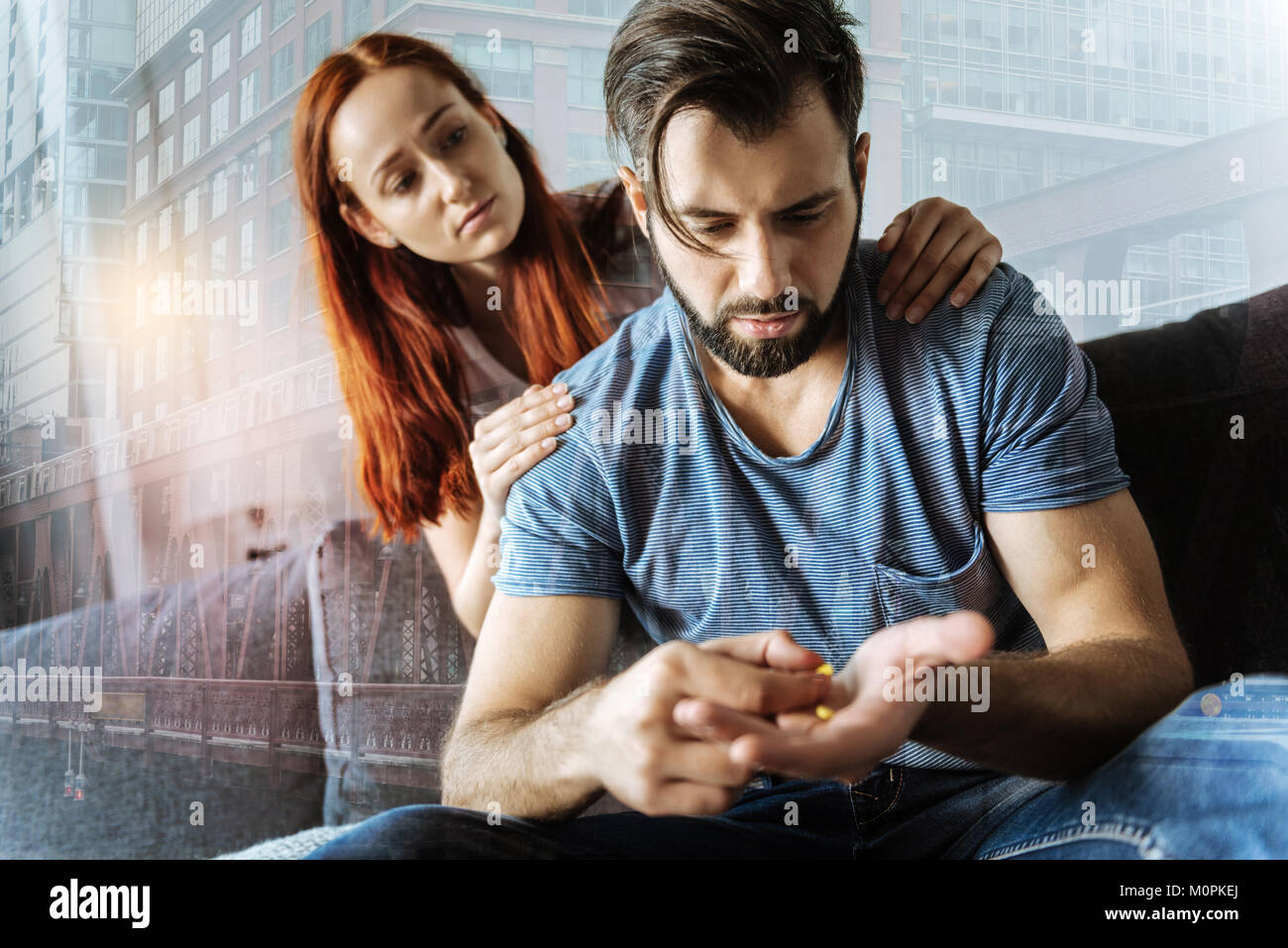 Worried girl embracing her boyfriend Stock Photo - Alamy
