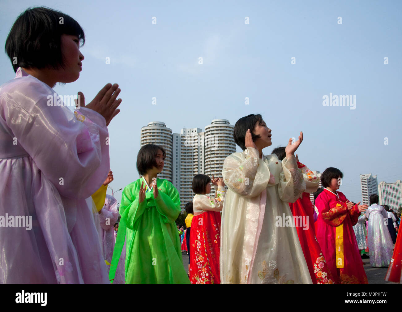 North Korean young adults during a mass dance performance in front of ...