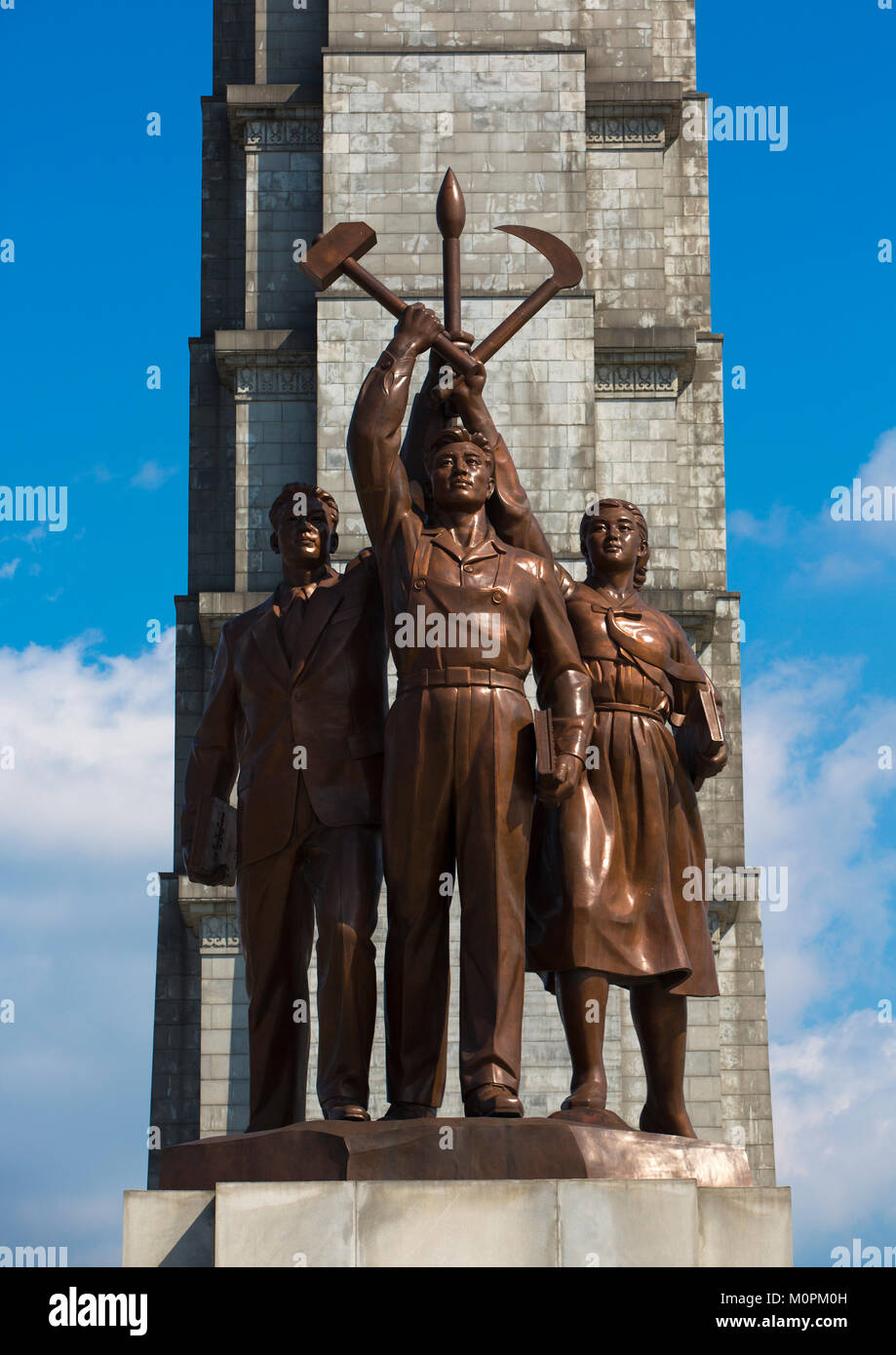 Bronze statues at the bottom of the Juche tower built to commemorate ...
