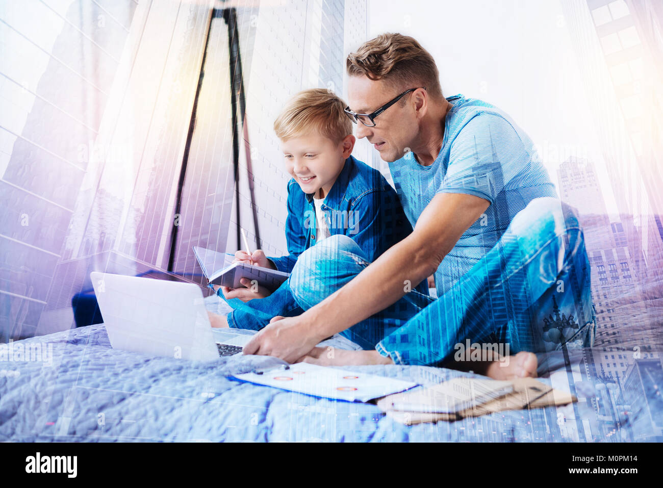 Concentrated male person explaining task Stock Photo - Alamy