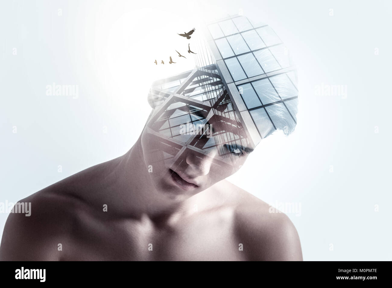 Promising attractive guy reaching success Stock Photo - Alamy