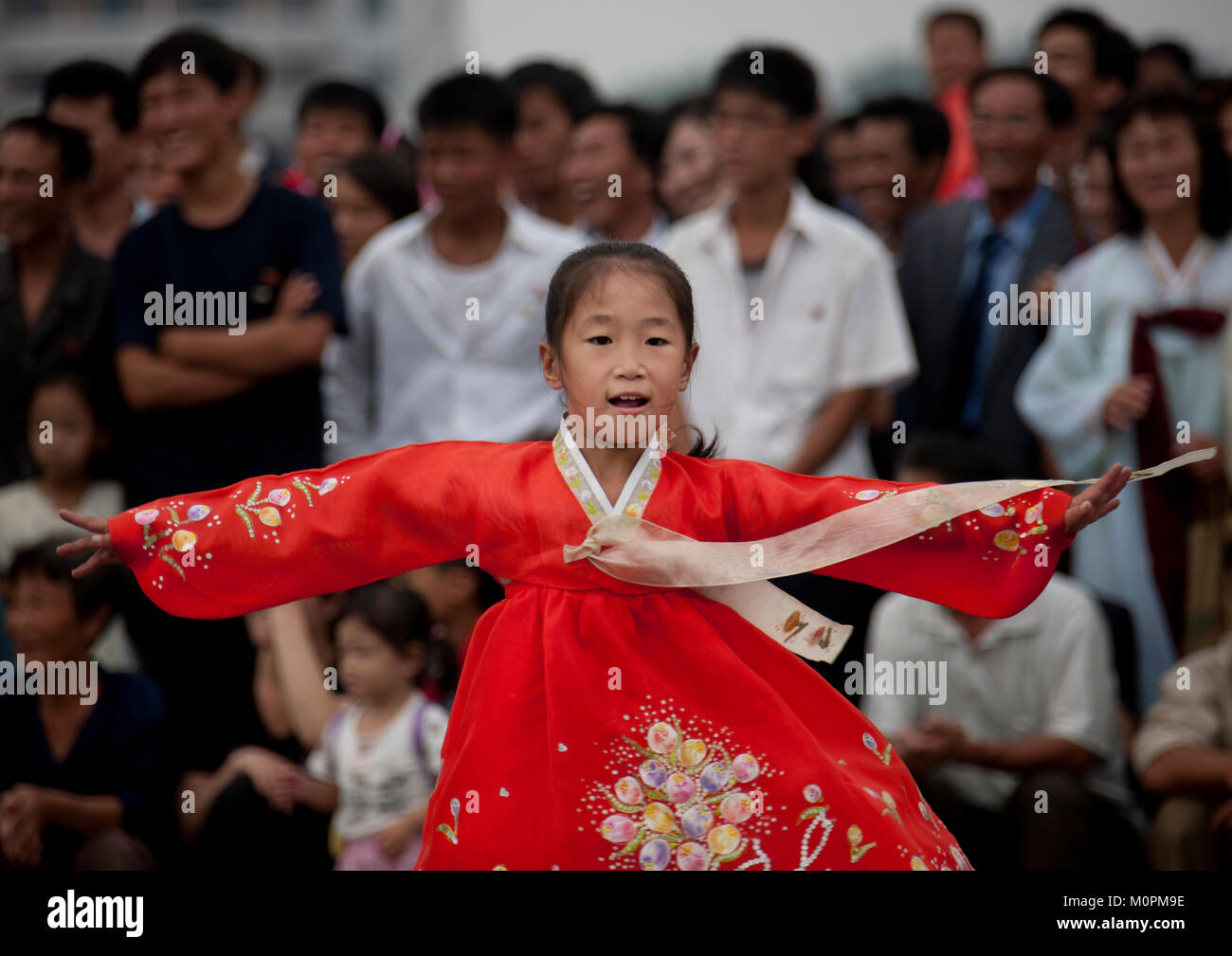 North Korean young girl dancing in traditional choson-ot on national ...