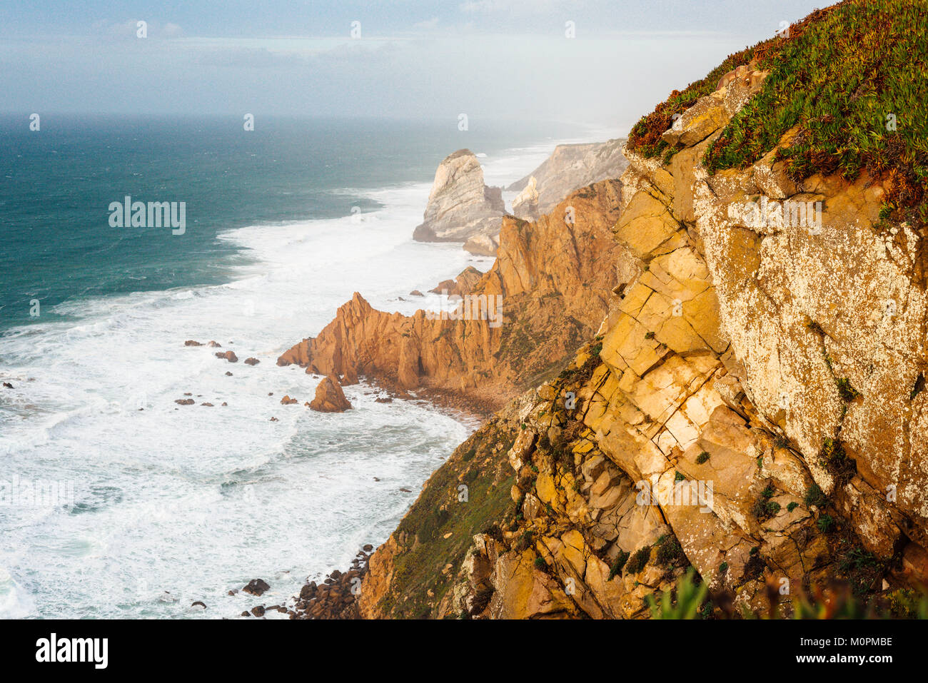 Cabo da Roca most western point of Europe at sunset. Ocean waves Stock ...