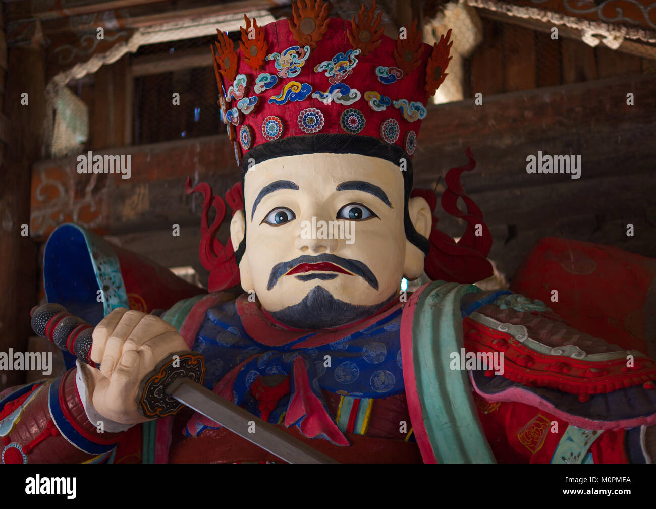 Colorful statue of jeungjang-cheonwang heavenly king of the south at ...