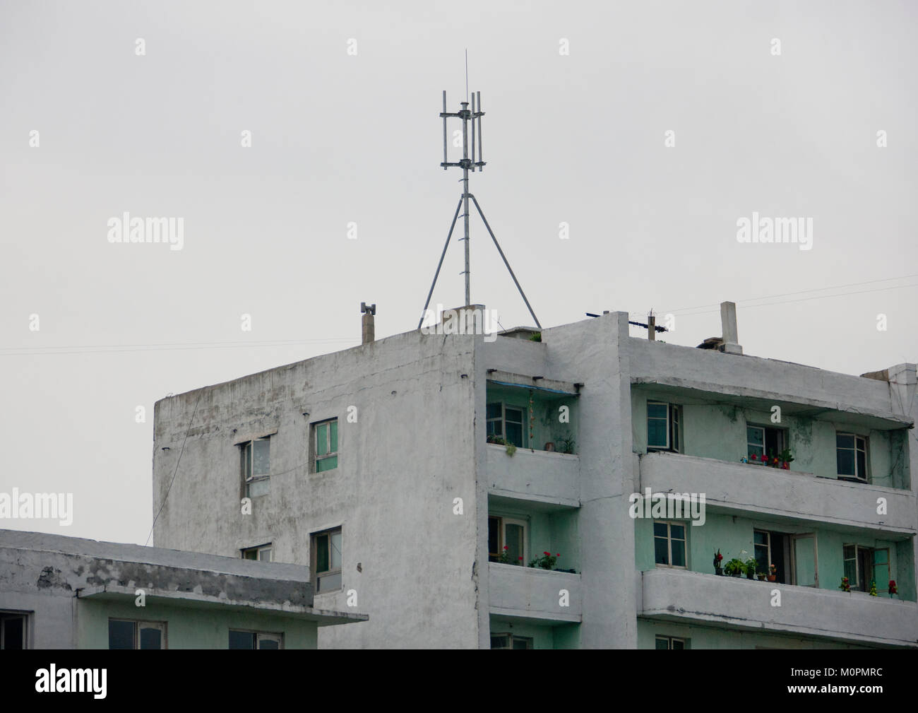 Cell phone network mast on the top of a residential building, Kangwon ...