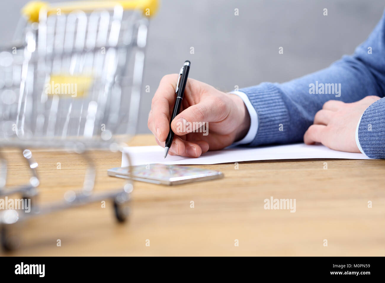 Signing documents. Signing documents. The man signs the documents Stock ...