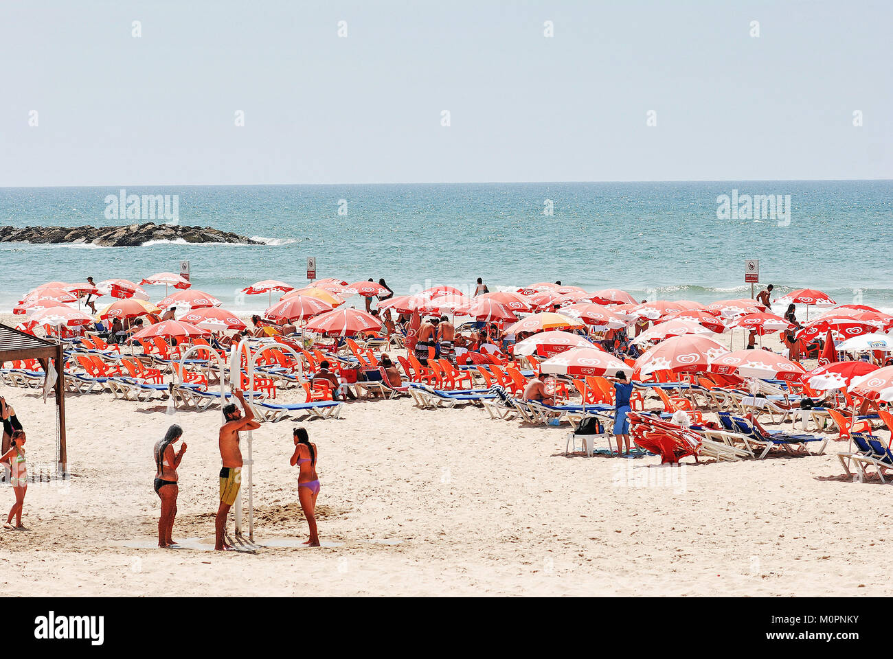 TEL AVIV, ISRAEL - AUGUST 18, 2010: Horizontal picture of people taking ...