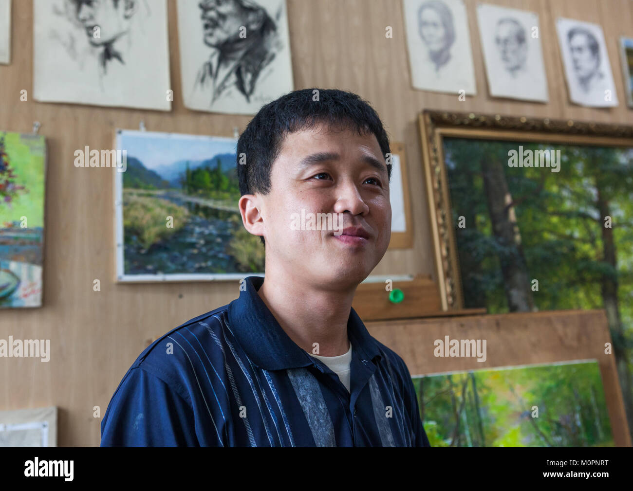 North korean artist painting hi-res stock photography and images - Alamy