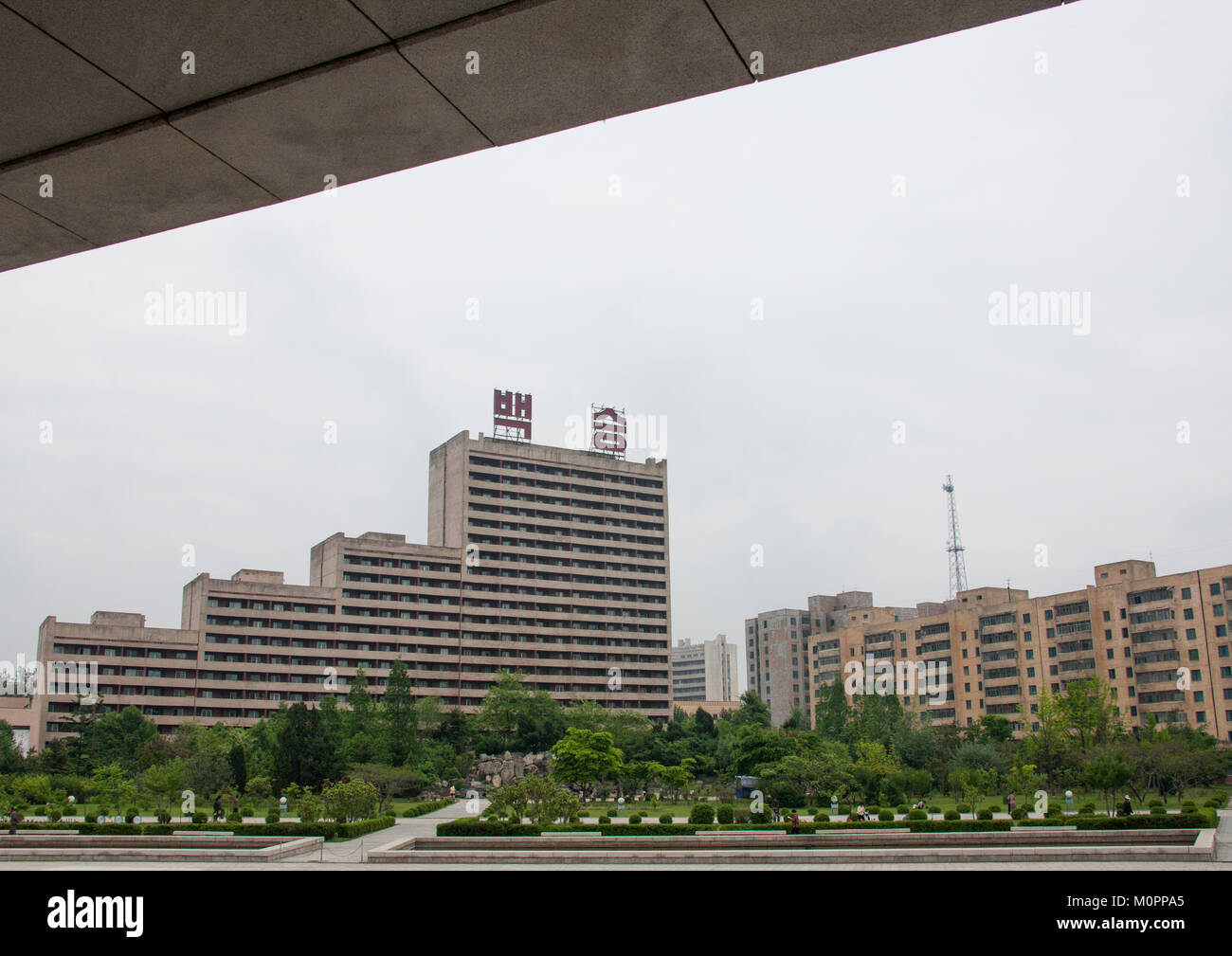 City buildings with propaganda slogan on the top, Pyongan Province ...